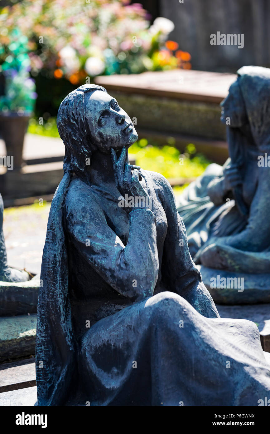5 JUNE 2018, MILAN, ITALY: Statues of mourning at the graves of the ...