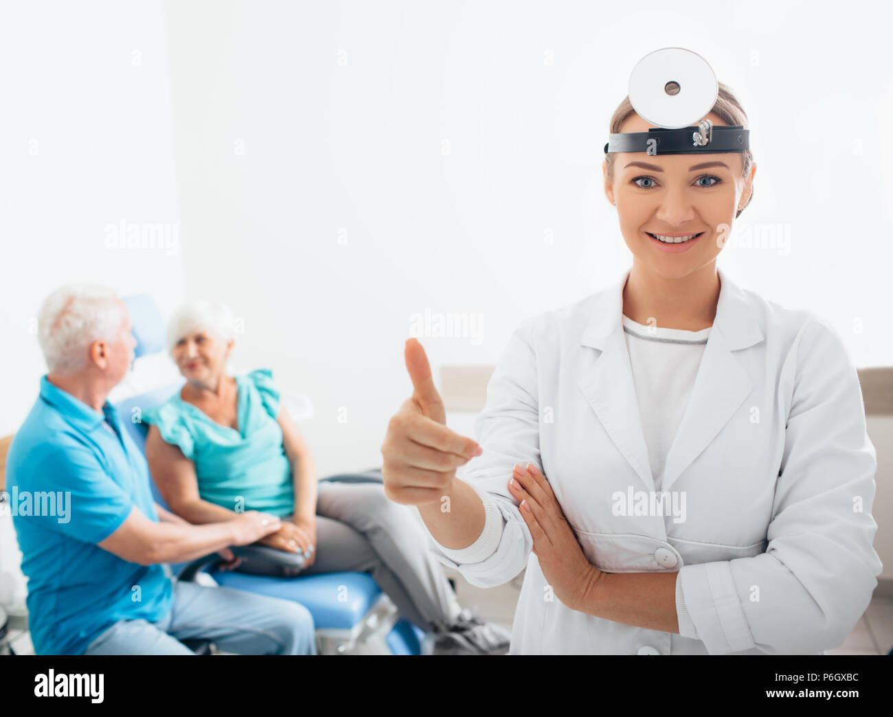 Doctor standing in patients room hi-res stock photography and images ...