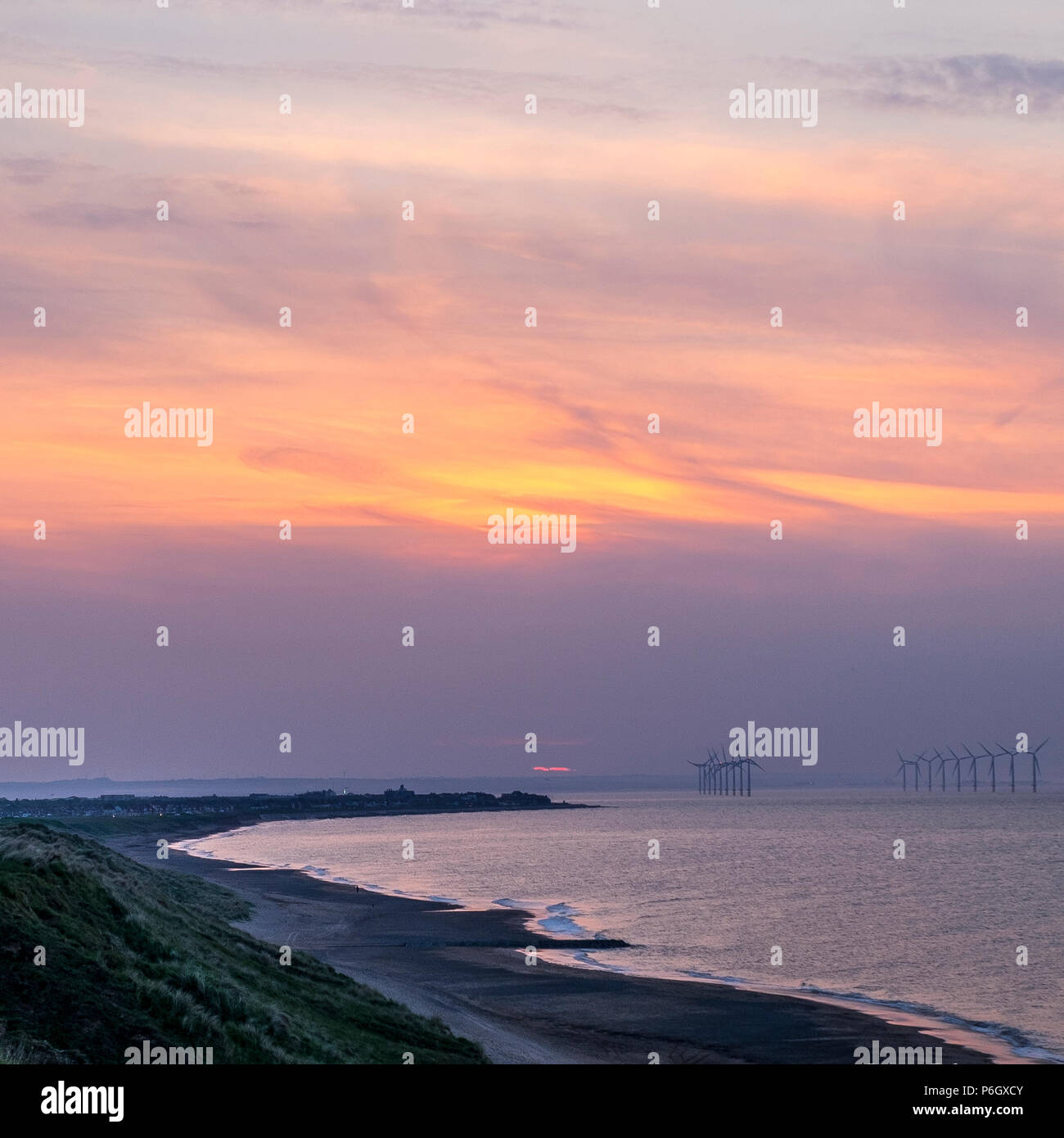 wind turbines & redcar from marske cliffs at sunset Stock Photo - Alamy