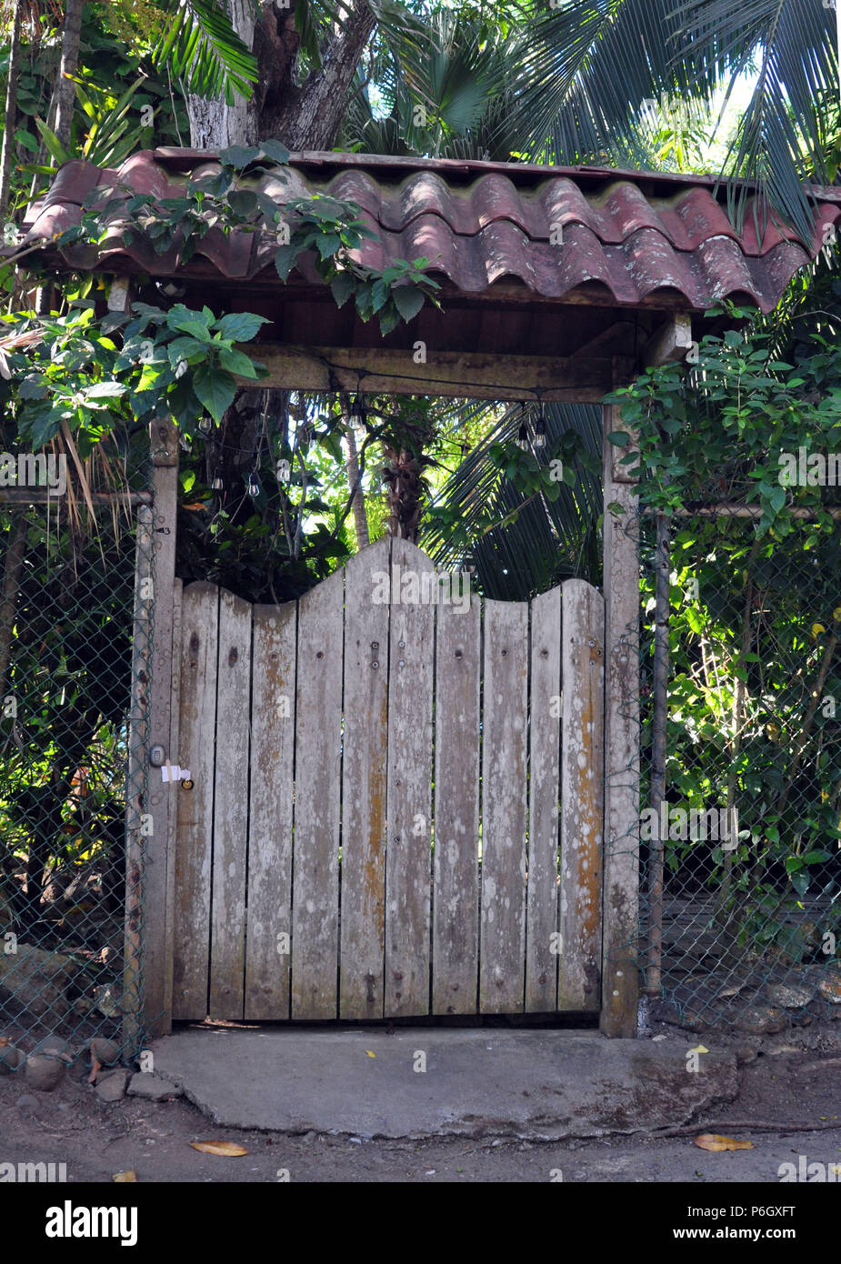 Entrance gate covered roof hi-res stock photography and images - Alamy