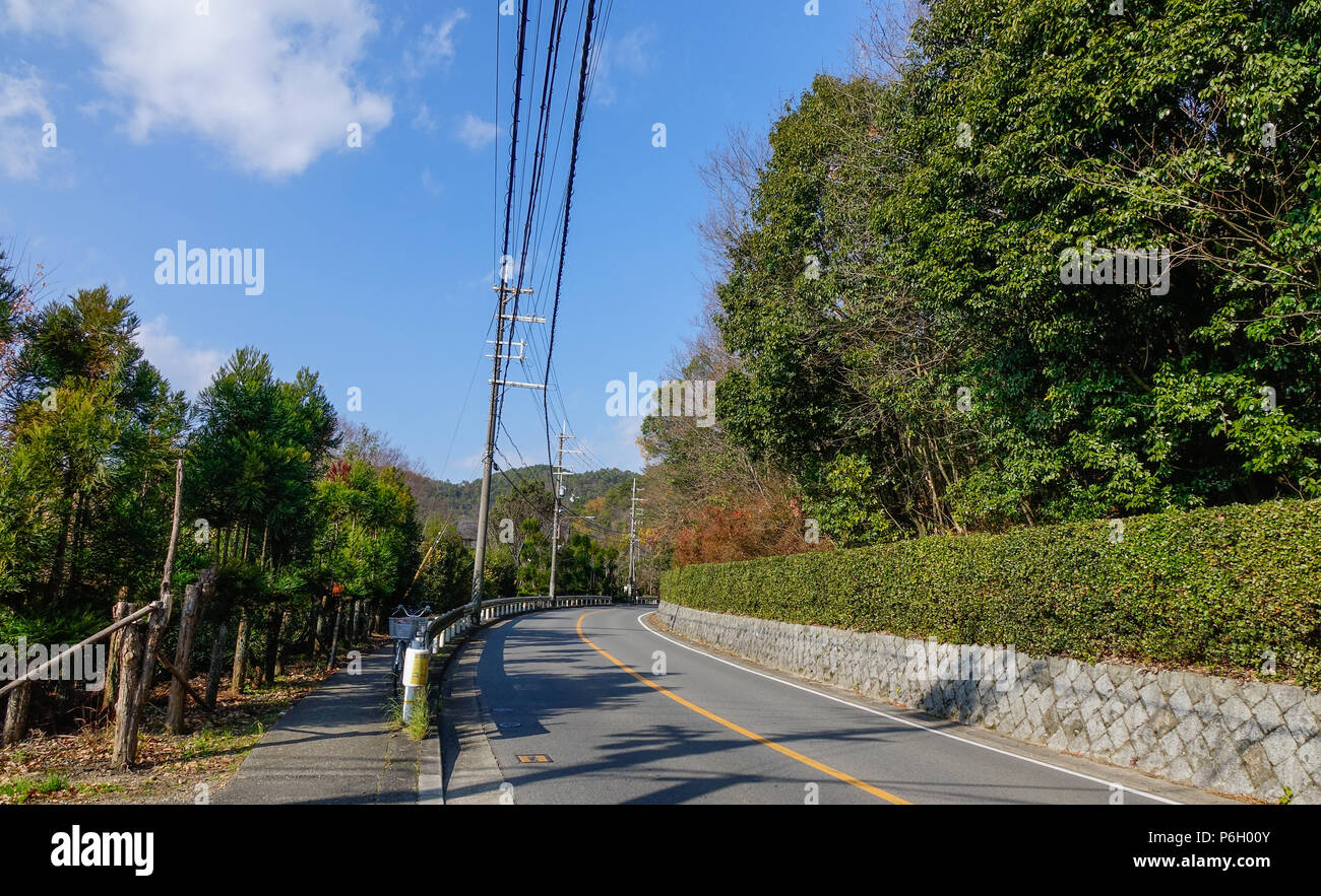 Kyoto, Japan - Dec 25, 2016. Rural street with many trees in Kyoto ...