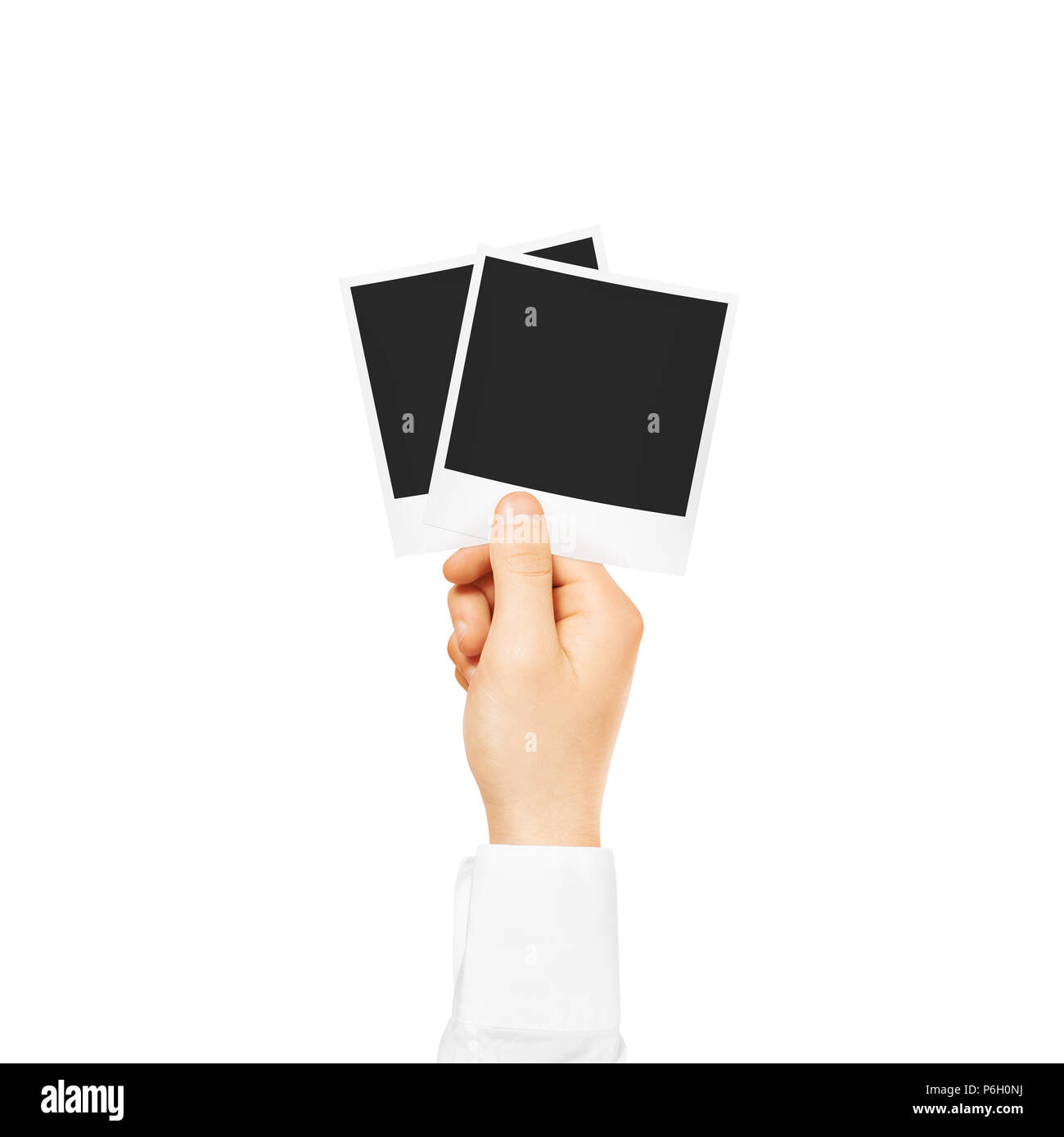 Hand holding blank photo frames mockup isolated. Empty old photography ...
