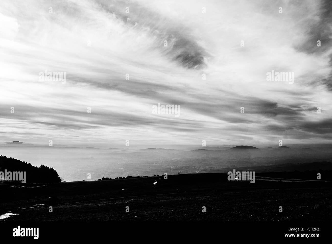 Subasio Mt. (Umbria, Italy), with sky covered by clouds and mist on the ...