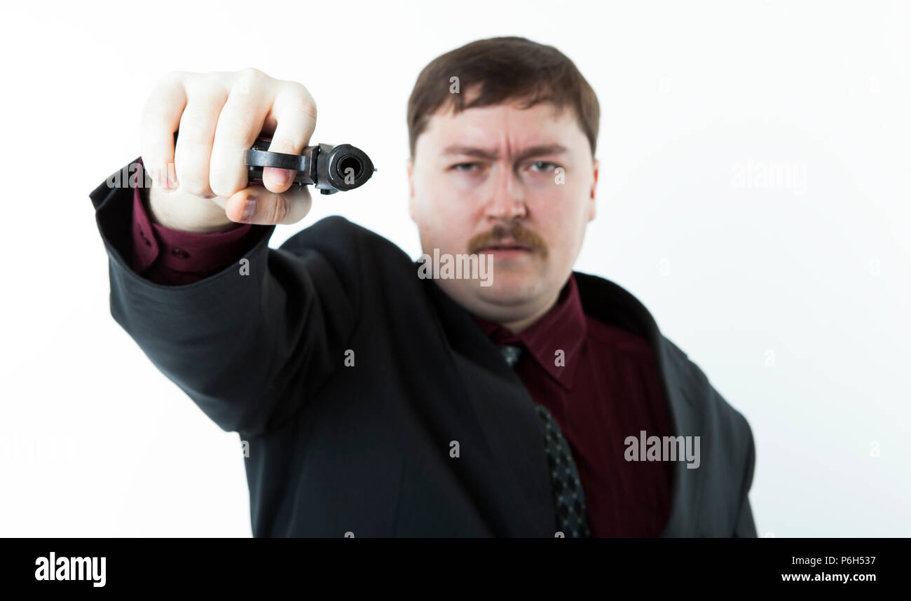 man aiming at you on a white background Stock Photo - Alamy