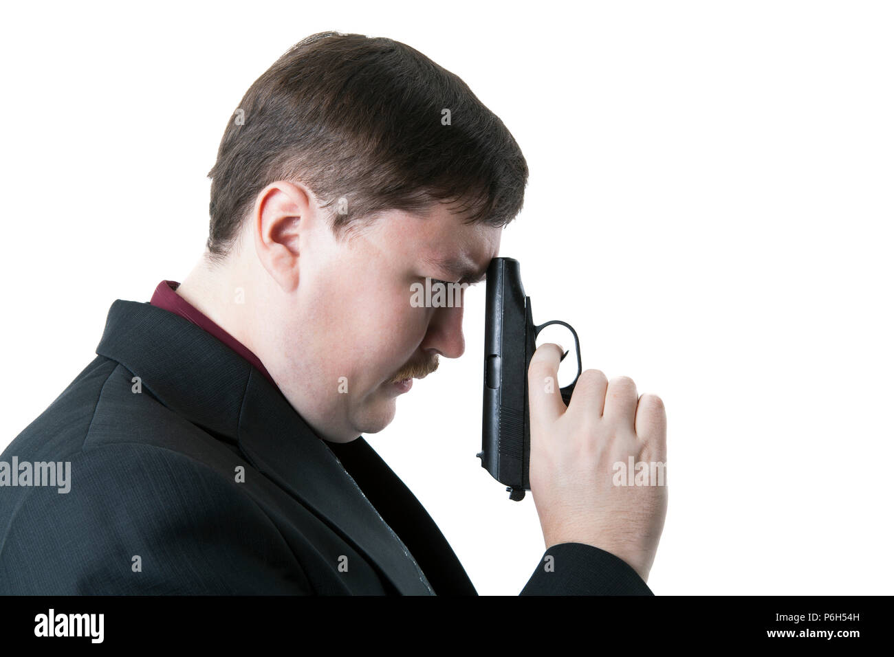 man holding a pistol on a white background Stock Photo - Alamy