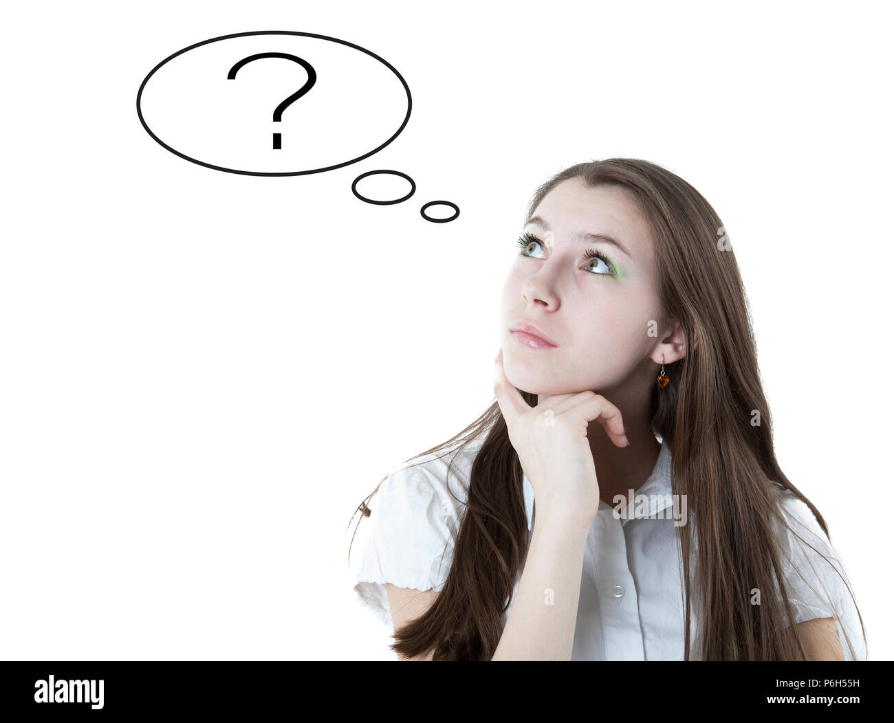 portrait of a girl thinking over the question on a white background ...