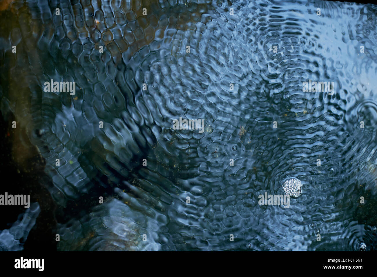 The texture of the ripples on the water. From of vibration, pulsation ...