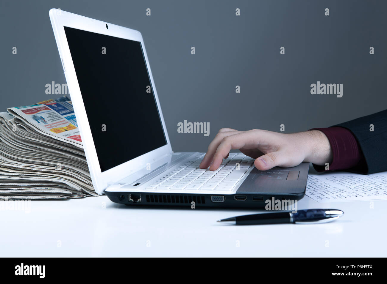human hand on the notebook keyboard close-up Stock Photo - Alamy