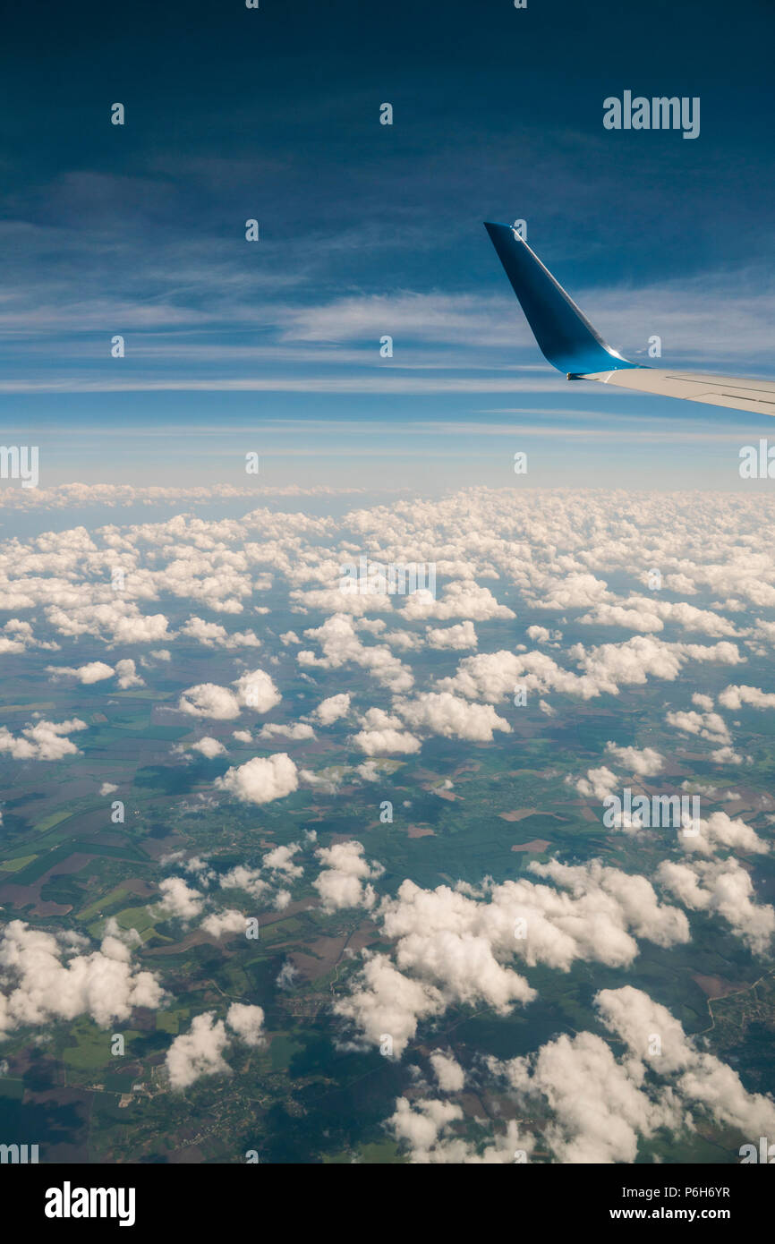 Aerial view of sky from aircraft window Stock Photo - Alamy