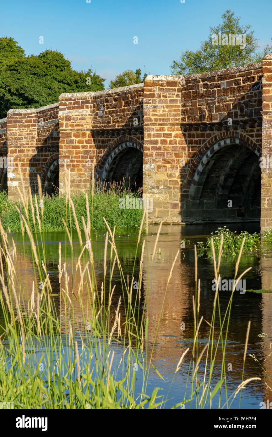 Sturminster Marshall Dorset England June 30, 2018 Old stone bridge ...
