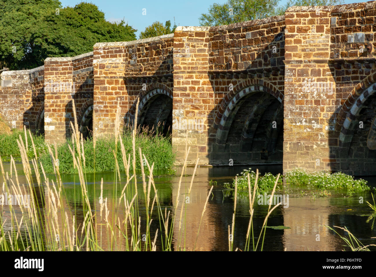 Sturminster Marshall Dorset England June 30, 2018 Old stone bridge ...