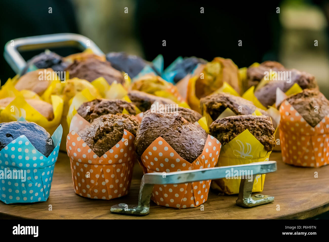 Wooden board of breakfast muffins for catering at corporate breakfast ...
