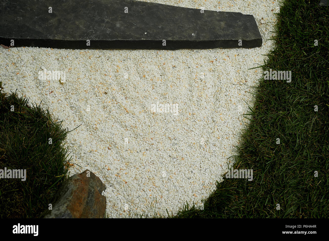Japanese relaxation garden. Rake is a pattern of small Galicia Stock ...