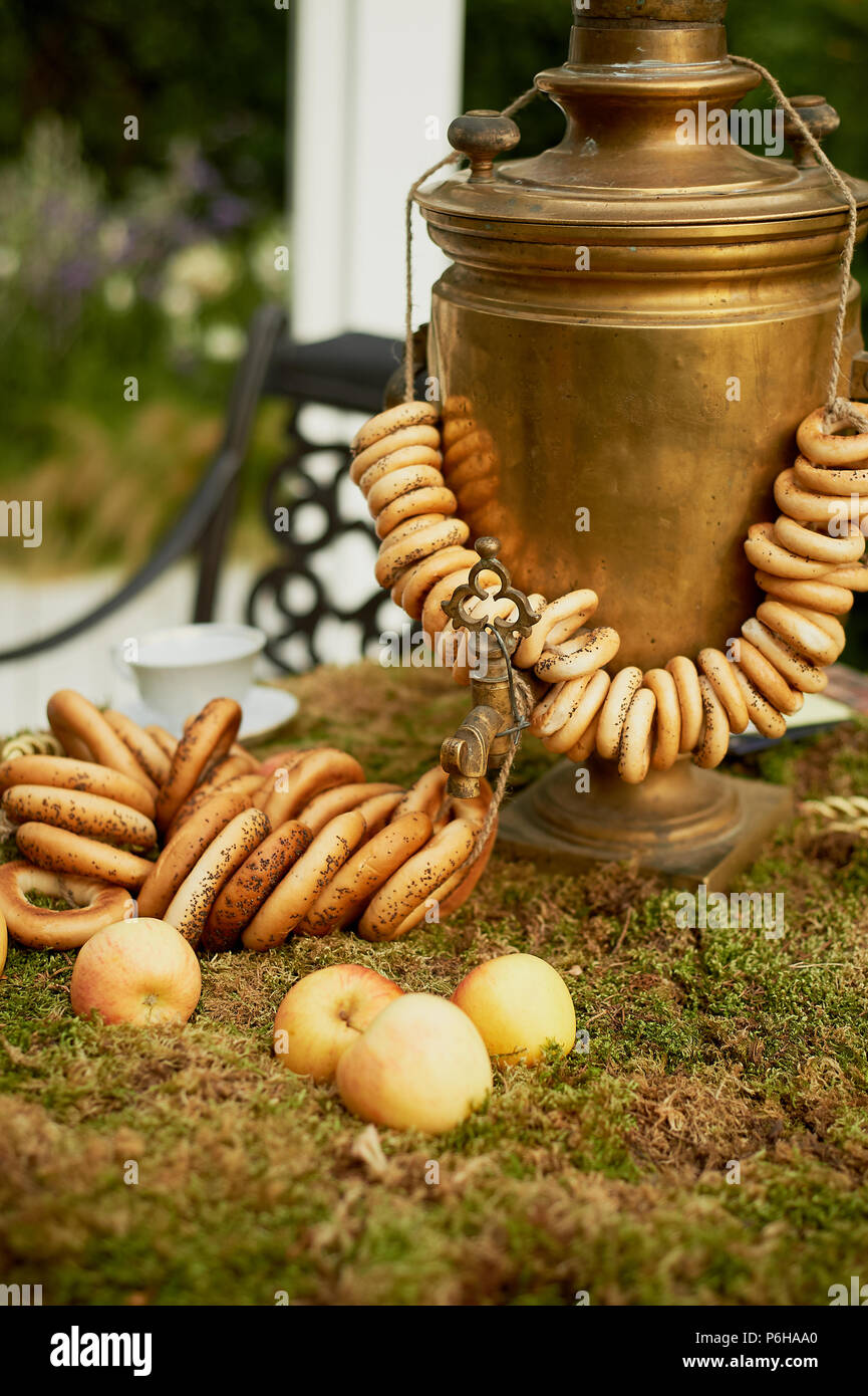 Russian samovar with steering wheels. Traditional tea party Stock Photo ...
