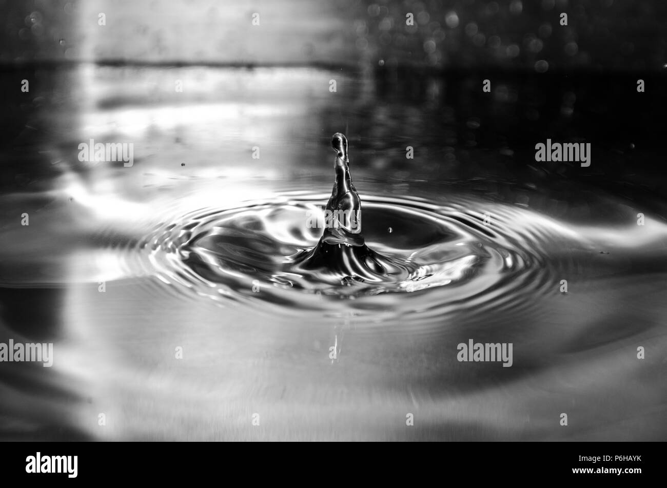 Waterdrop with silver background Stock Photo - Alamy