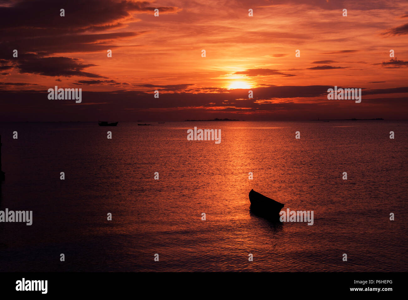 Beautiful sunset with calm water Stock Photo - Alamy