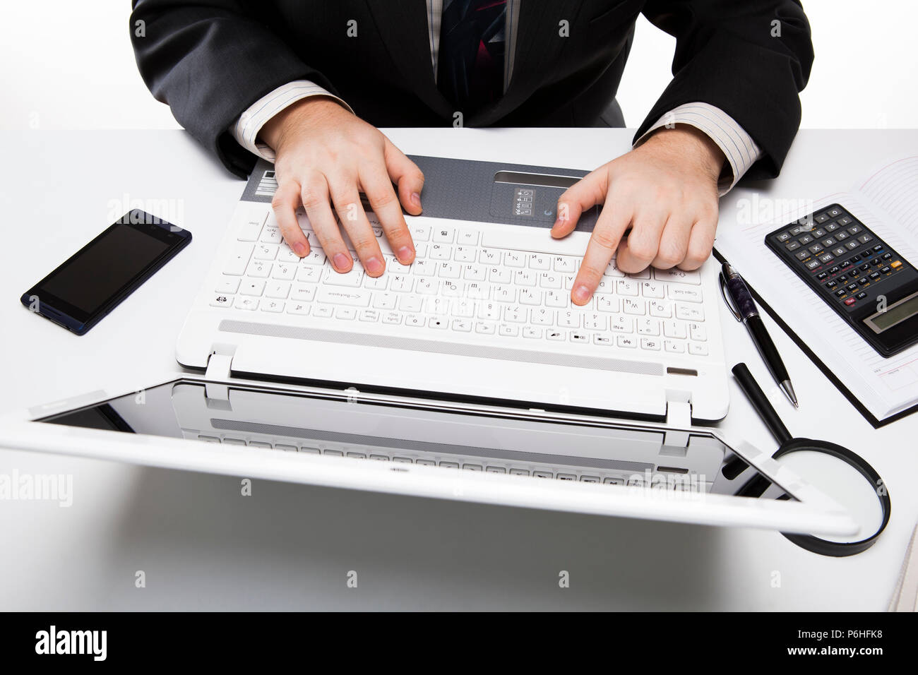 human fingers on the notebook keyboard close-up Stock Photo - Alamy