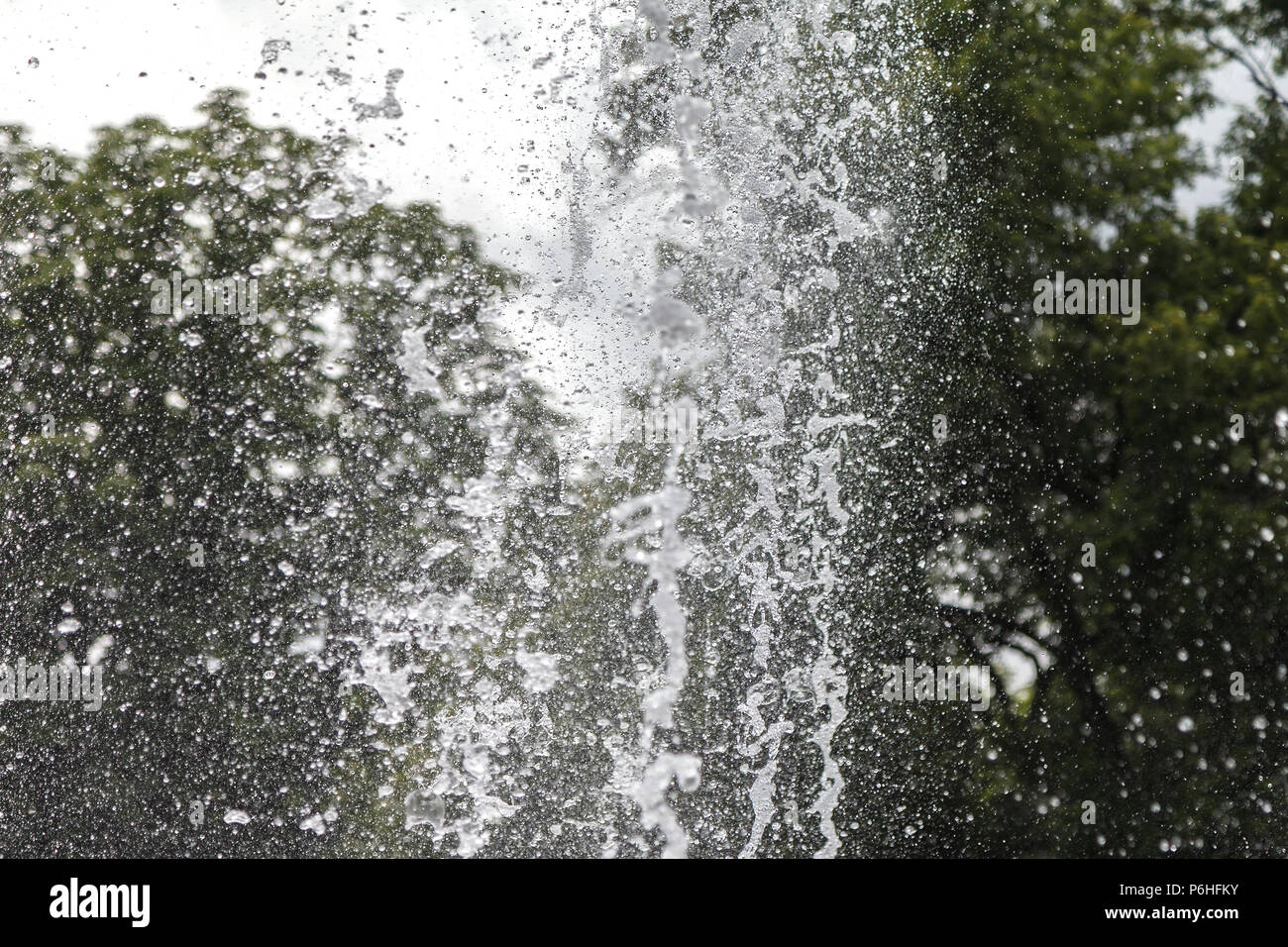 Splashing water from a fountain. Stopping fluid movement Stock Photo ...