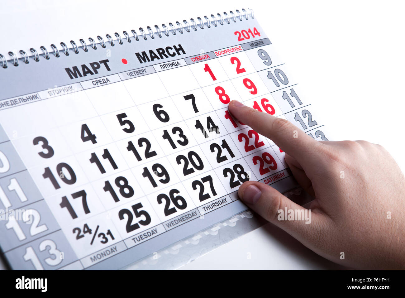 Human hand and wall calendar with the number of days Stock Photo - Alamy