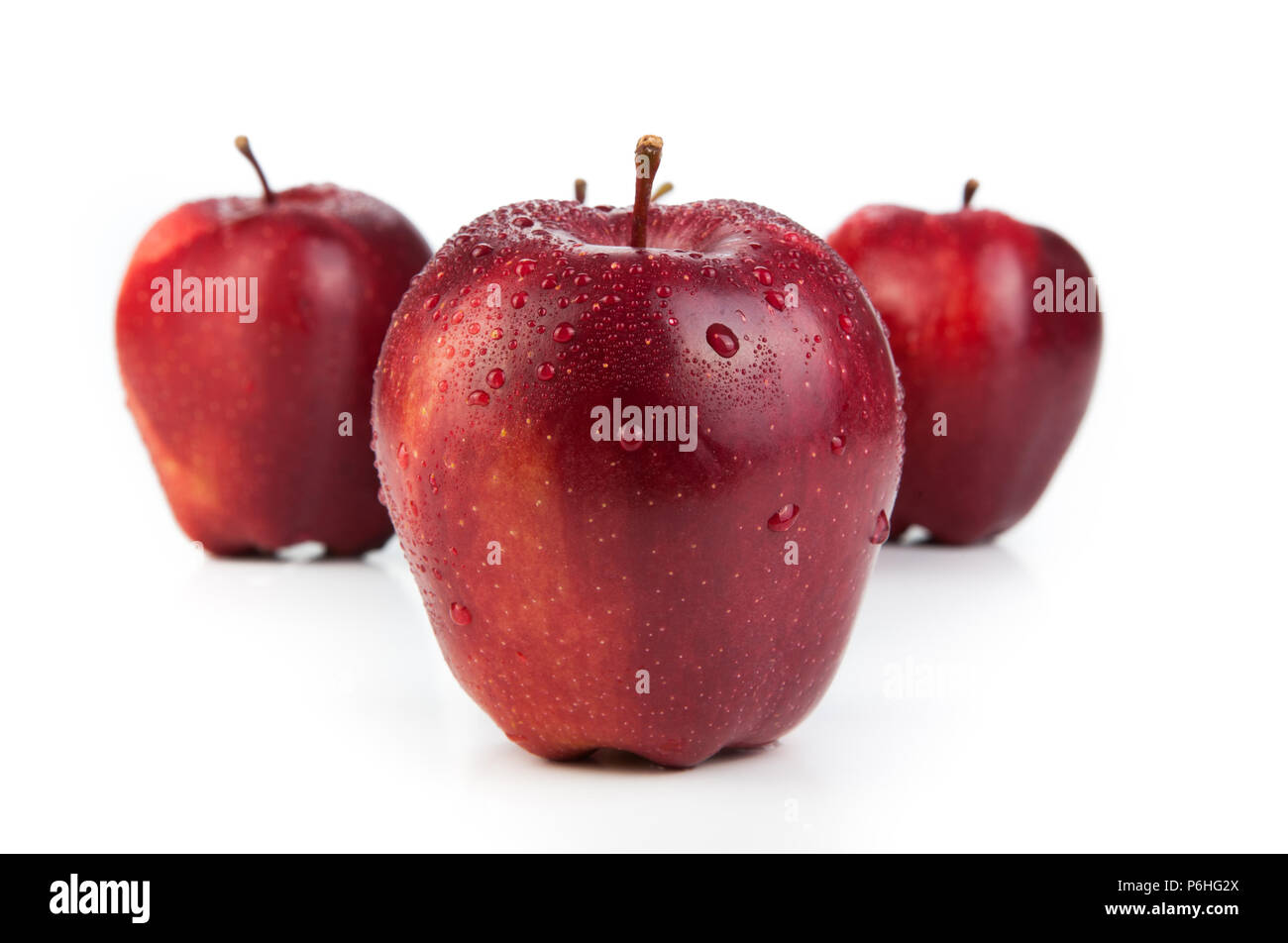 maroon apples closeup on a white background Stock Photo - Alamy