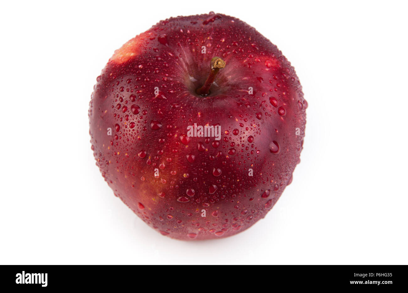 maroon apple closeup on a white background Stock Photo - Alamy
