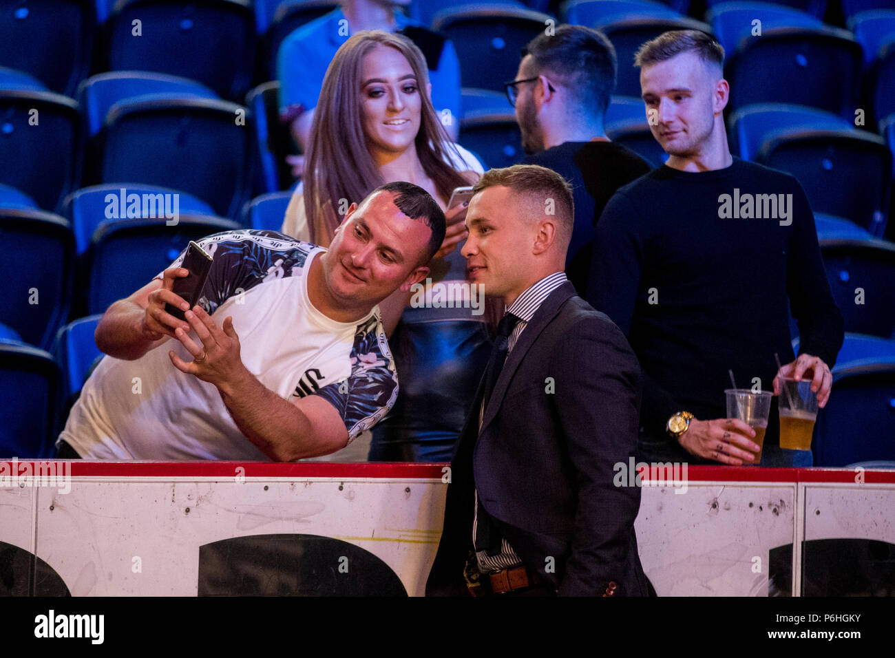 Boxer Carl Frampton (centre) poses for a selfie with a fan at the SSE ...