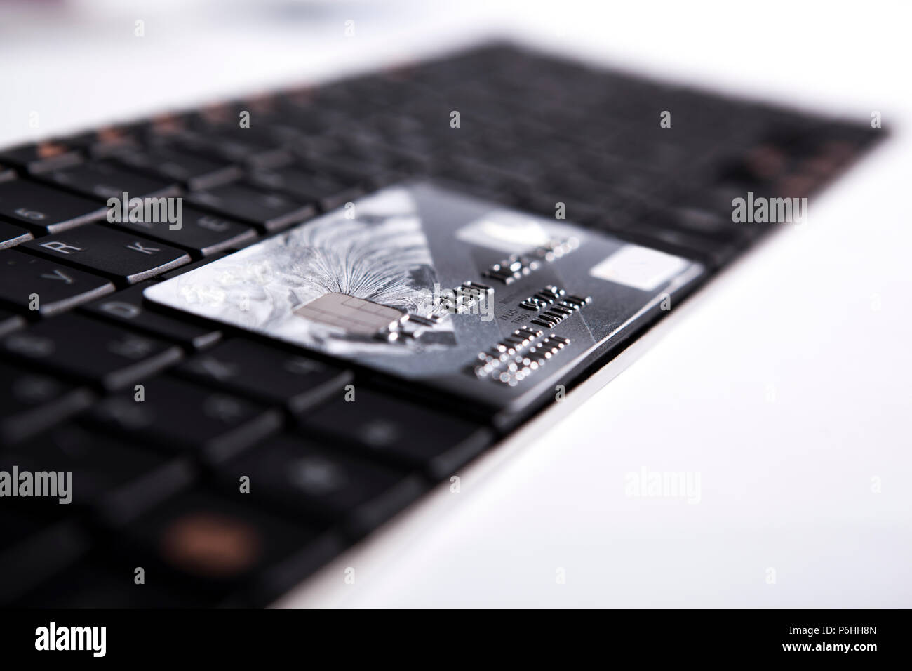 bank card on a keyboard close-up Stock Photo - Alamy