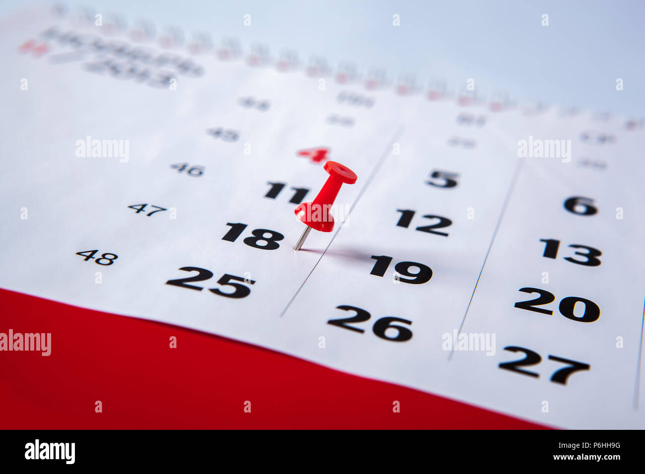 sheet of a calendar with point close-up Stock Photo - Alamy