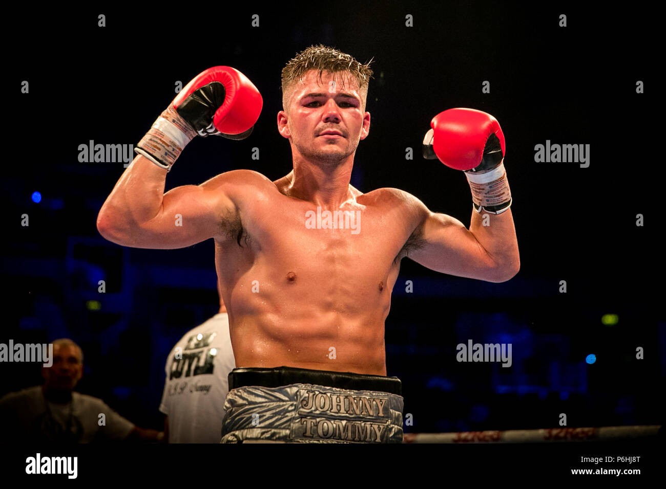 Johnny Coyle poses after defeating Lewis Benson during a Super ...