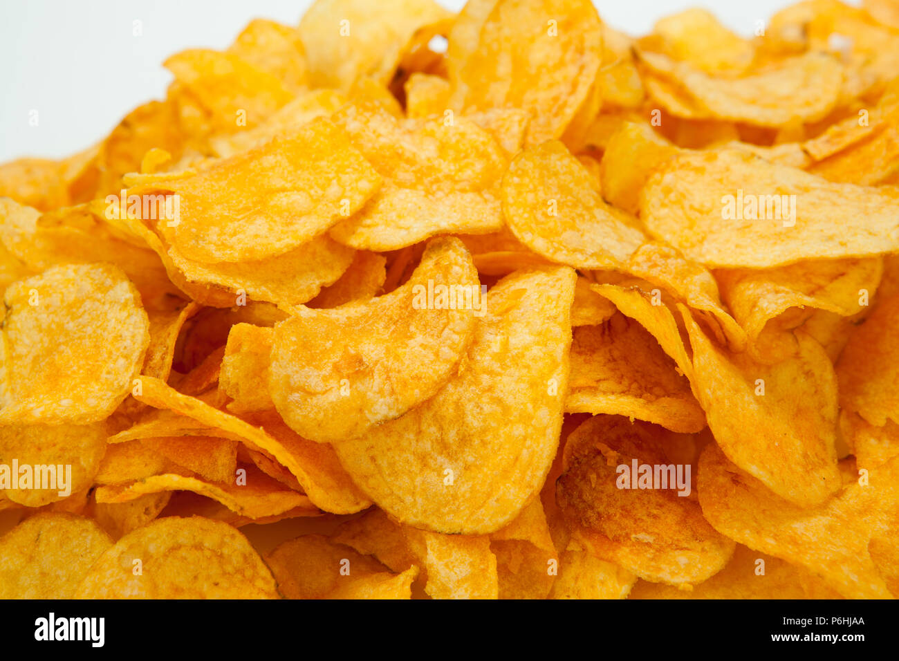 handful of potato chips close-up Stock Photo - Alamy