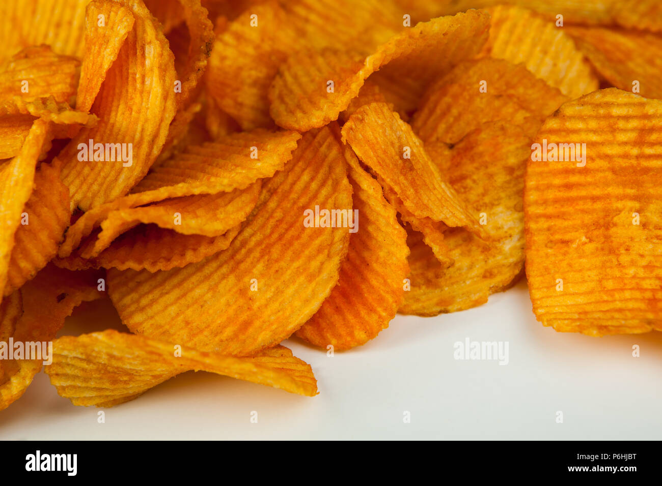 handful of potato chips close-up Stock Photo - Alamy