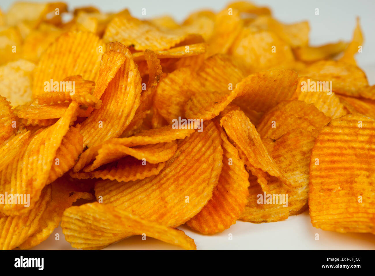 Handful potato chips hi-res stock photography and images - Alamy