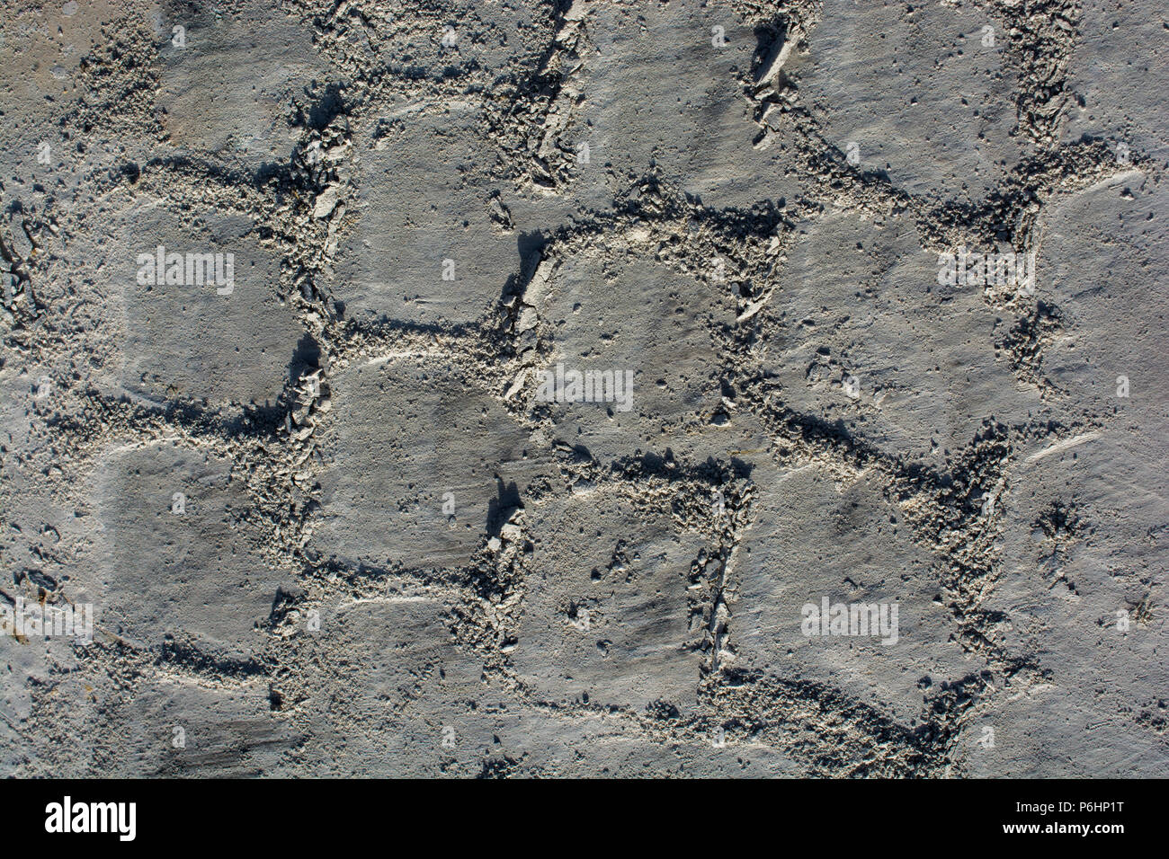 Patterns on a freshly poured concrete surface Stock Photo - Alamy