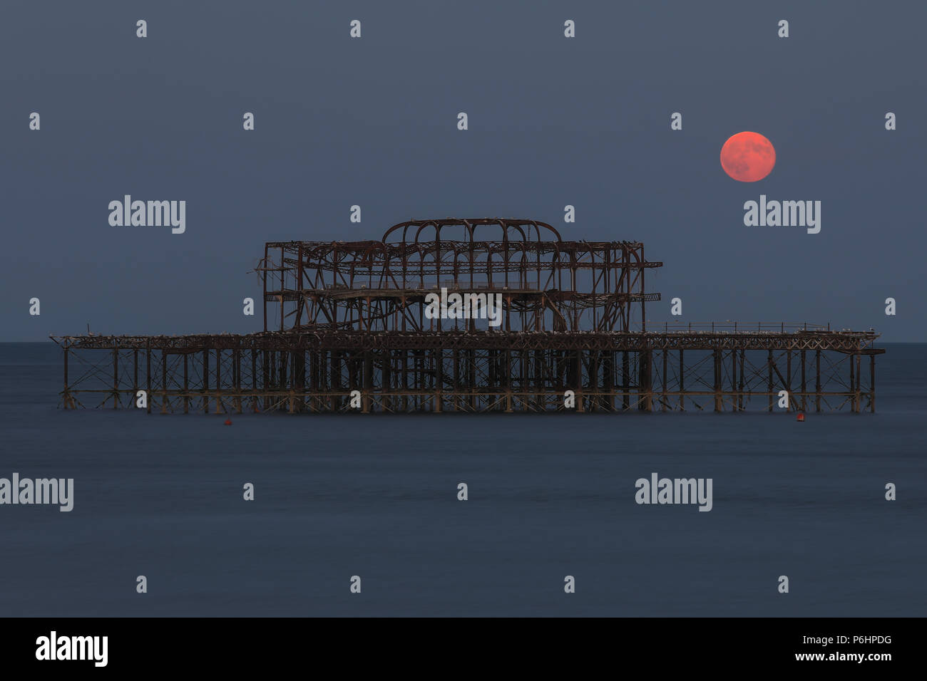 Red moon rising Stock Photo - Alamy