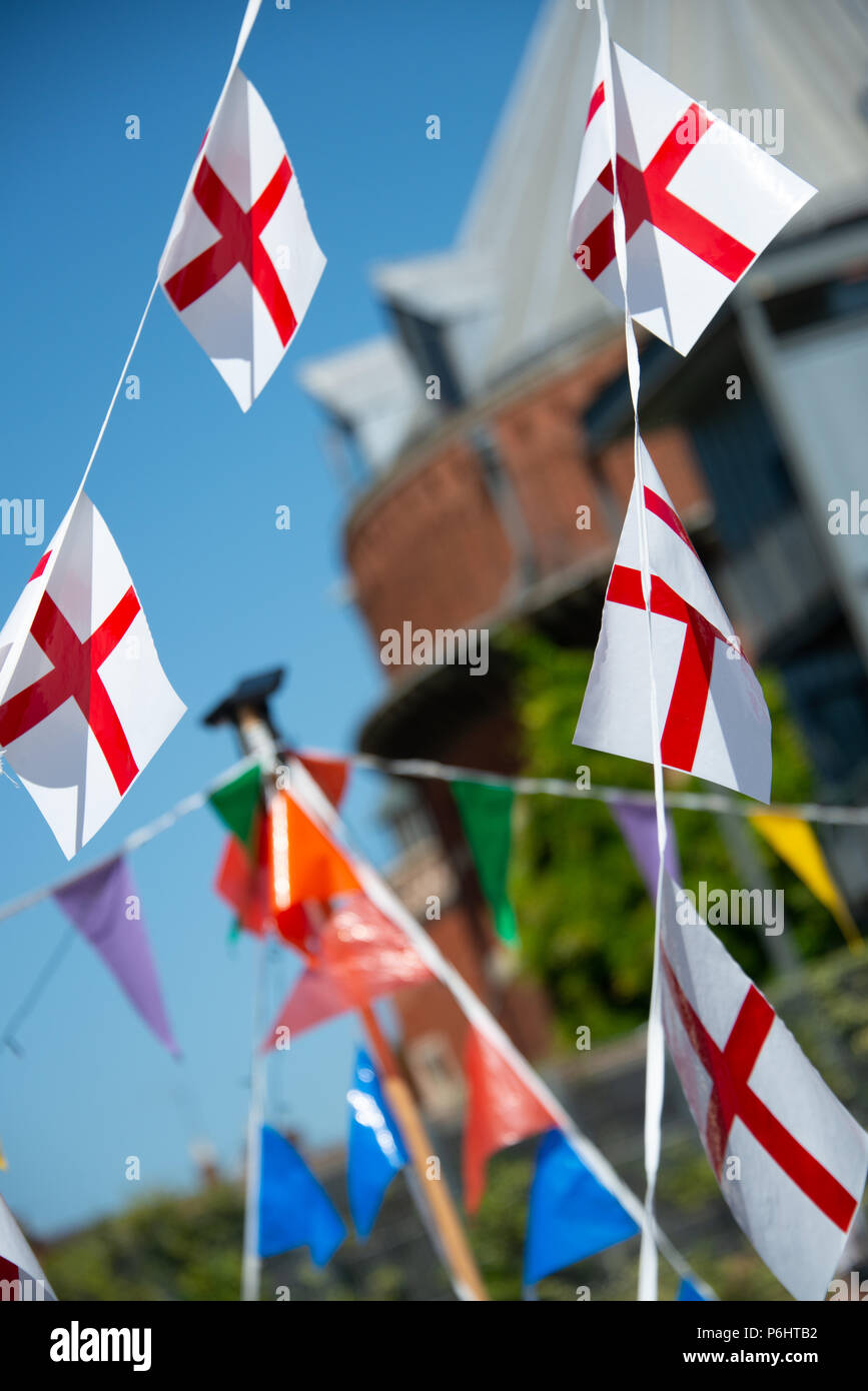 bright England flag bunting with Russian building in background Stock ...