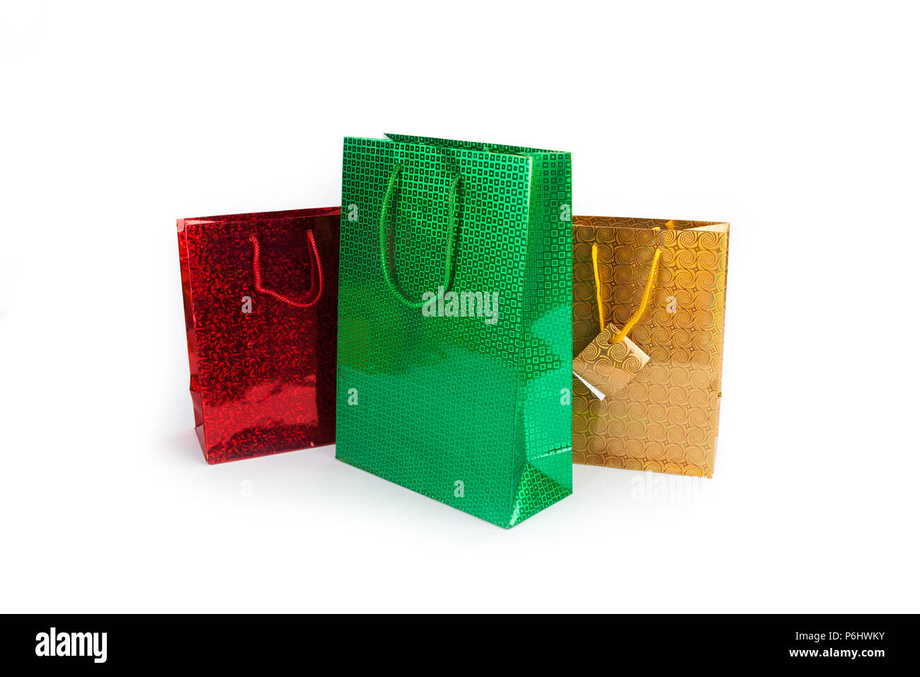 Three gift Bags on white background Stock Photo - Alamy