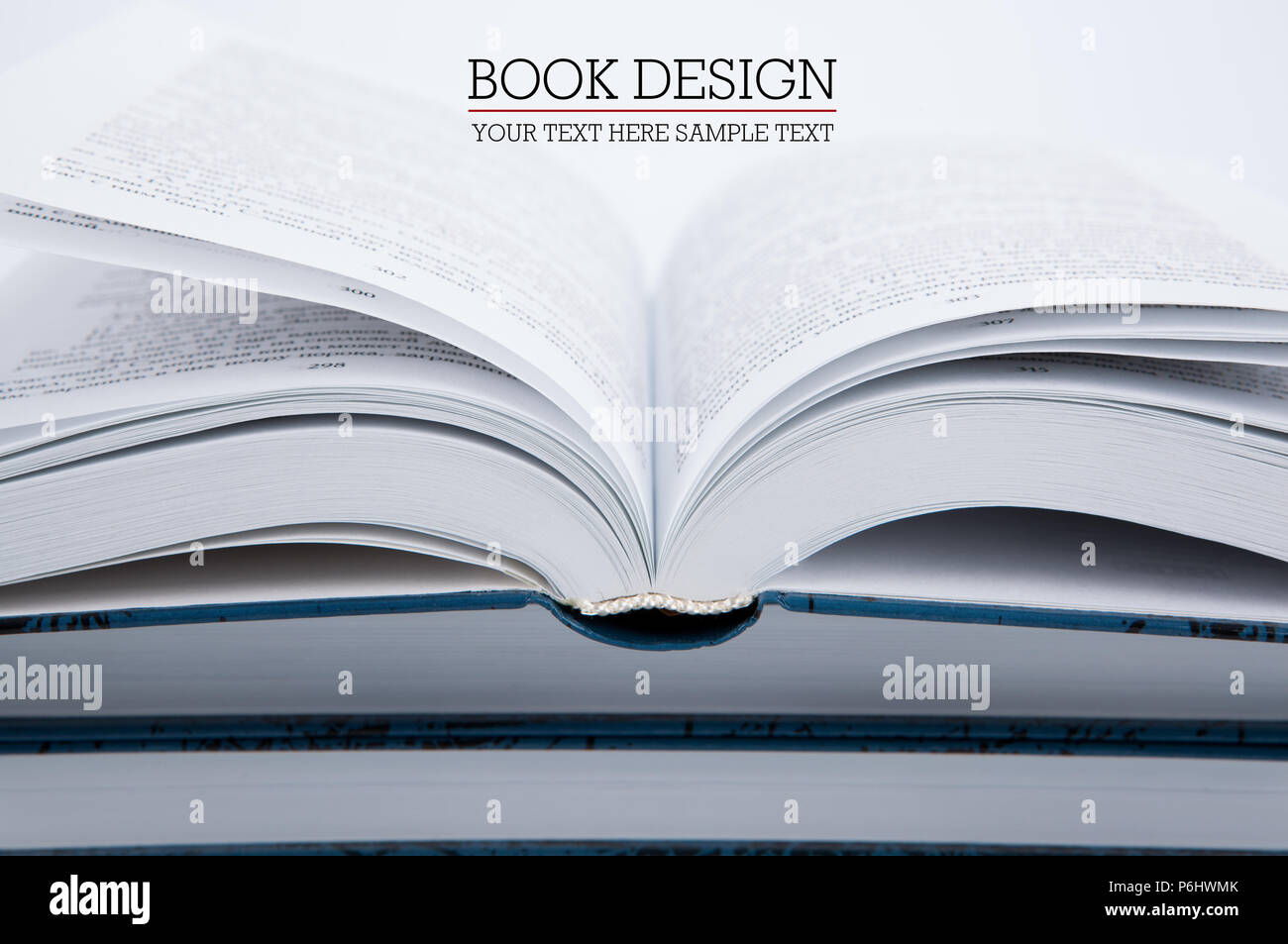Pages of the book macro on white background Stock Photo - Alamy