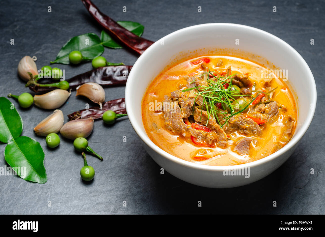 Thai red chili Panang curry with beef Stock Photo - Alamy