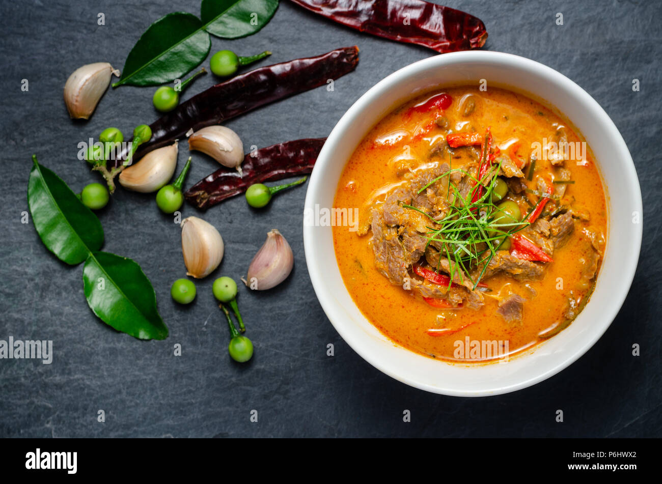 Thai red chili Panang curry with beef Stock Photo - Alamy
