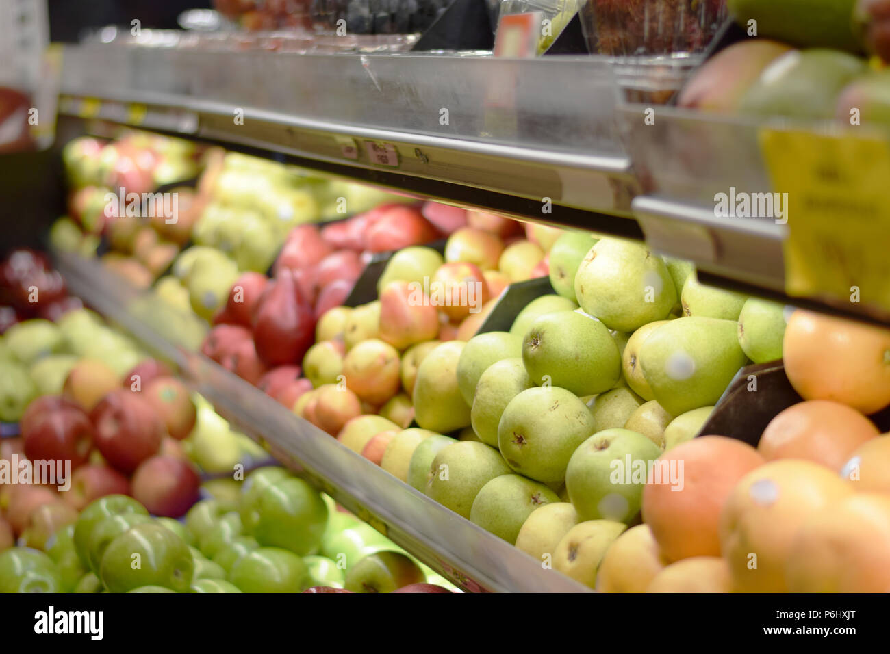 Fresh organic fruits and produce on a supermarket shelf Stock Photo - Alamy