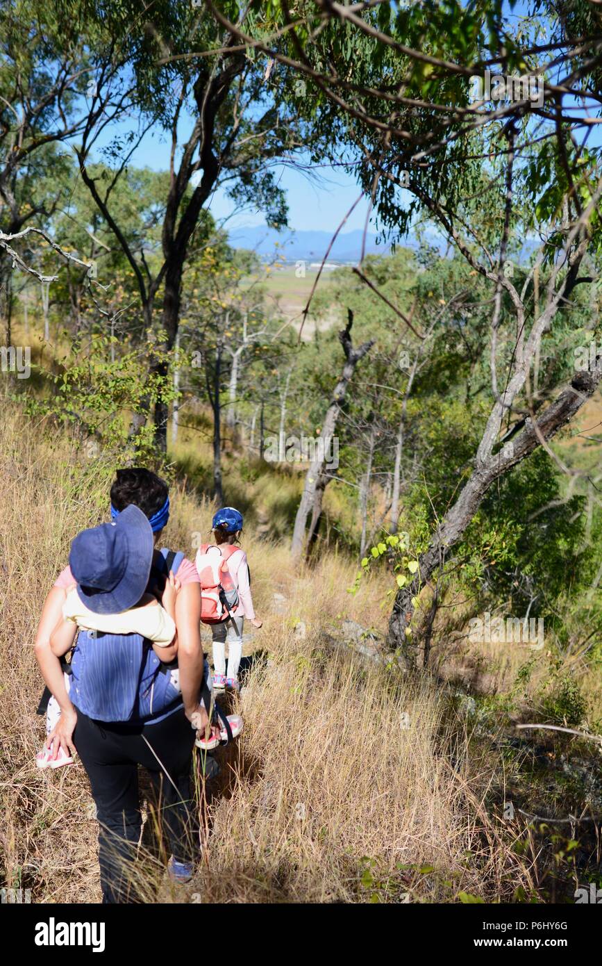Mother walks with children through the Australian bush, Many peaks hike ...