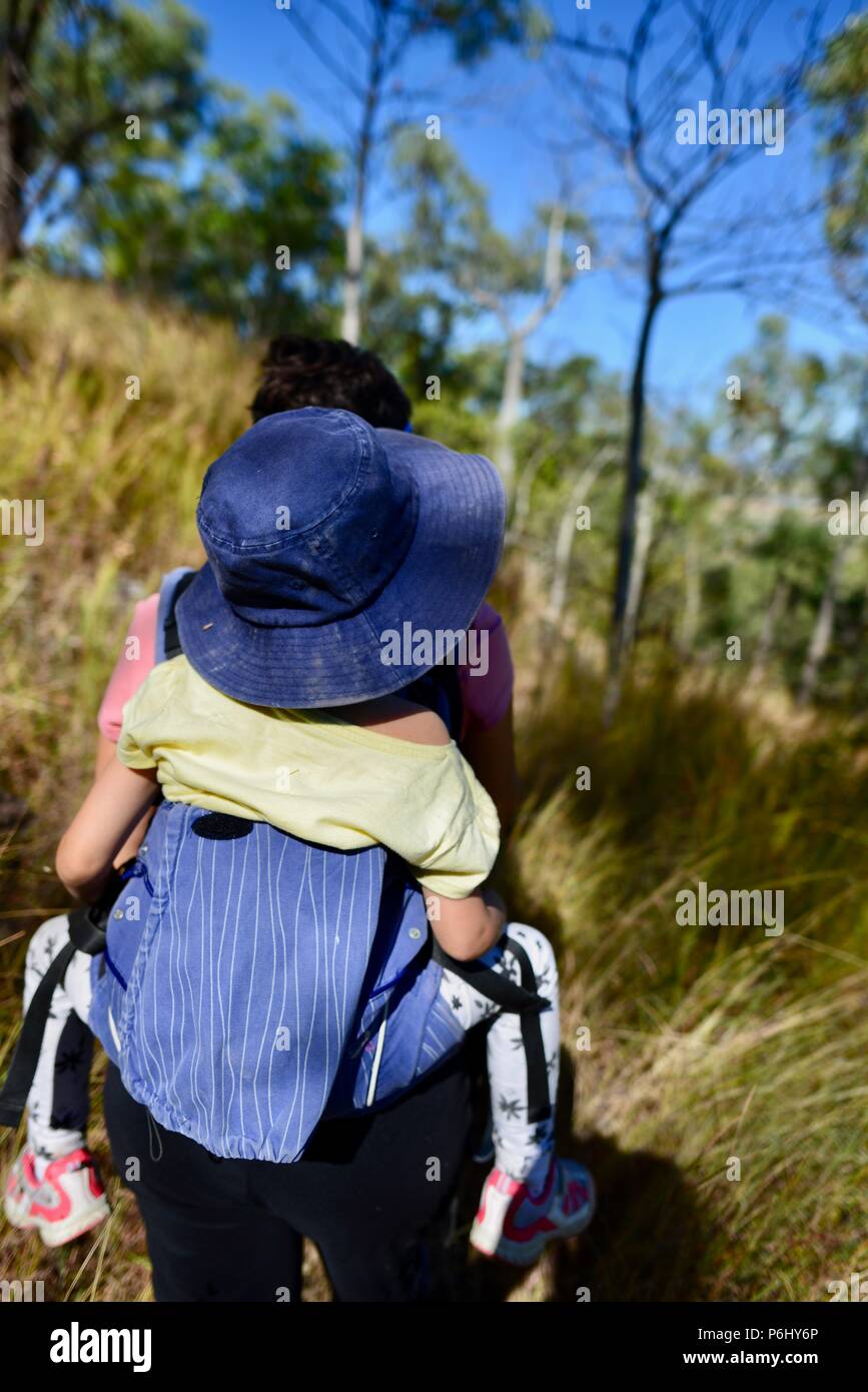 Mother walks with children through the Australian bush, Many peaks hike ...