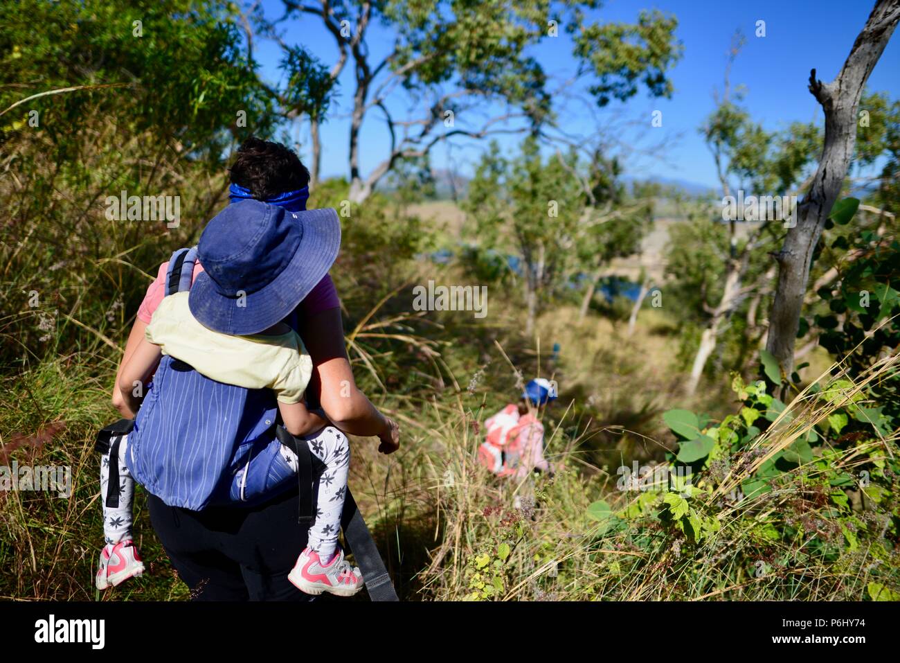 Mother walks with children through the Australian bush, Many peaks hike ...