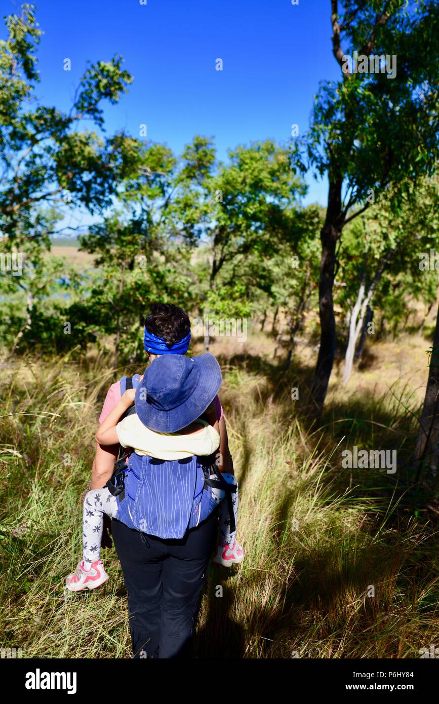 Mother walks with children through the Australian bush, Many peaks hike ...