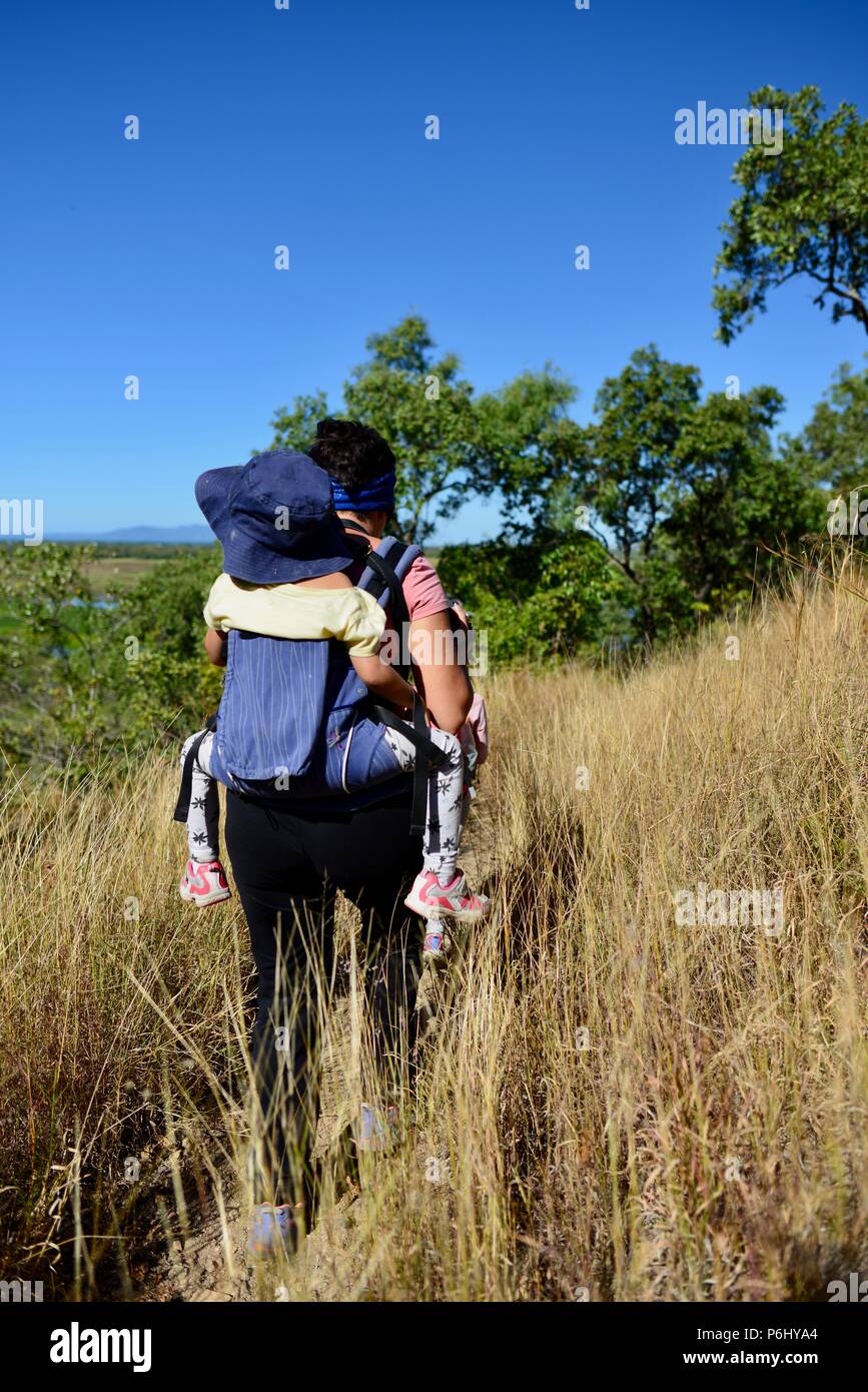 Mother walks with children through the Australian bush, Many peaks hike ...