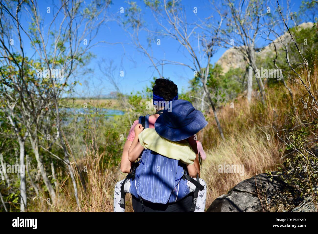 Mother walks with children through the Australian bush, Many peaks hike ...