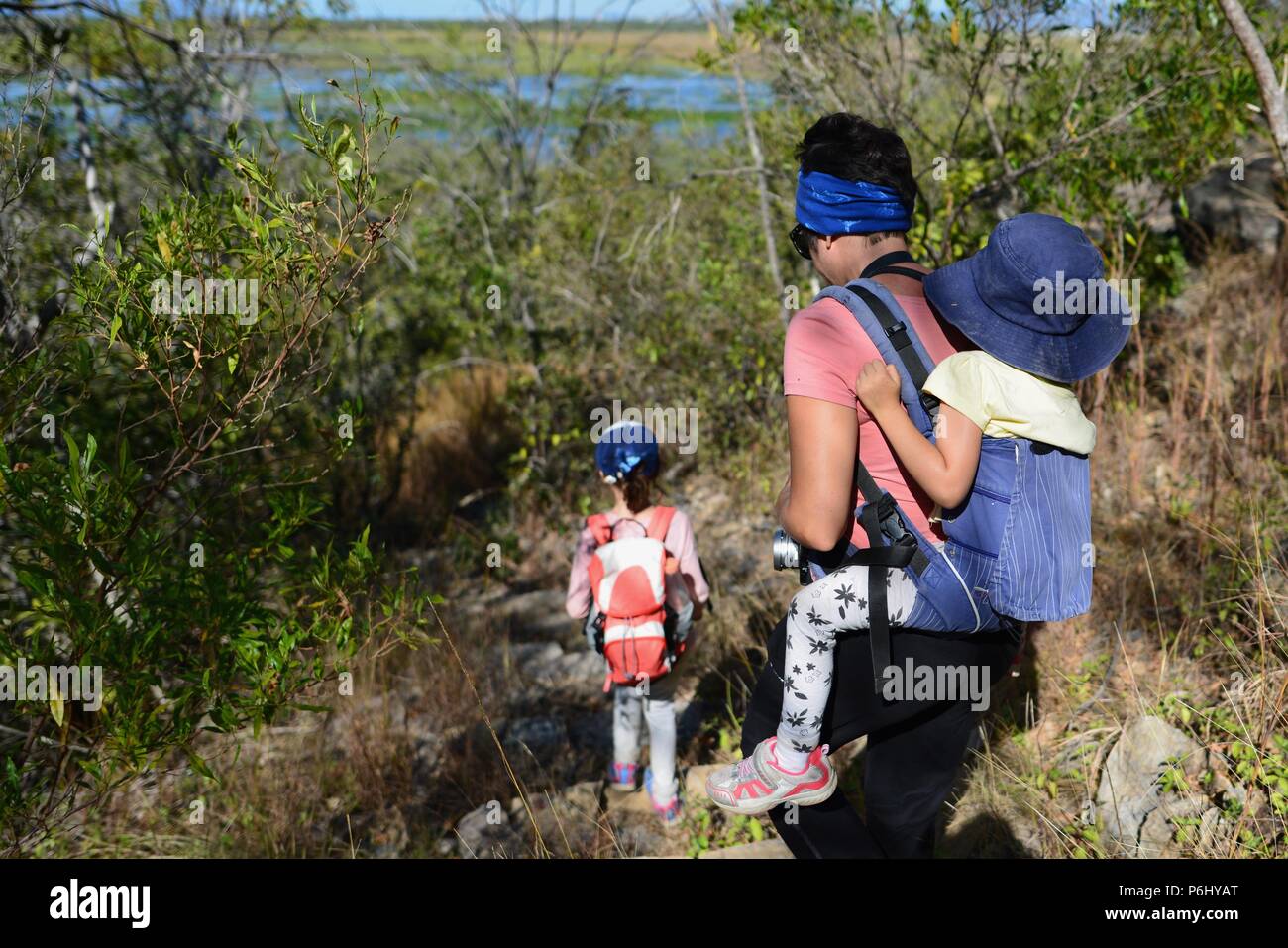 Mother walks with children through the Australian bush, Many peaks hike ...