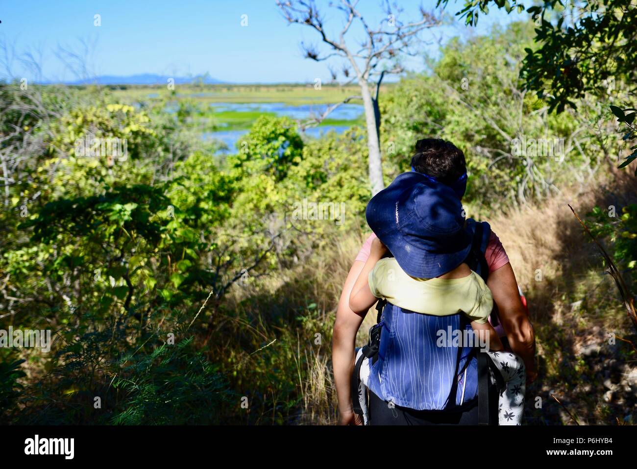 Mother walks with children through the Australian bush, Many peaks hike ...