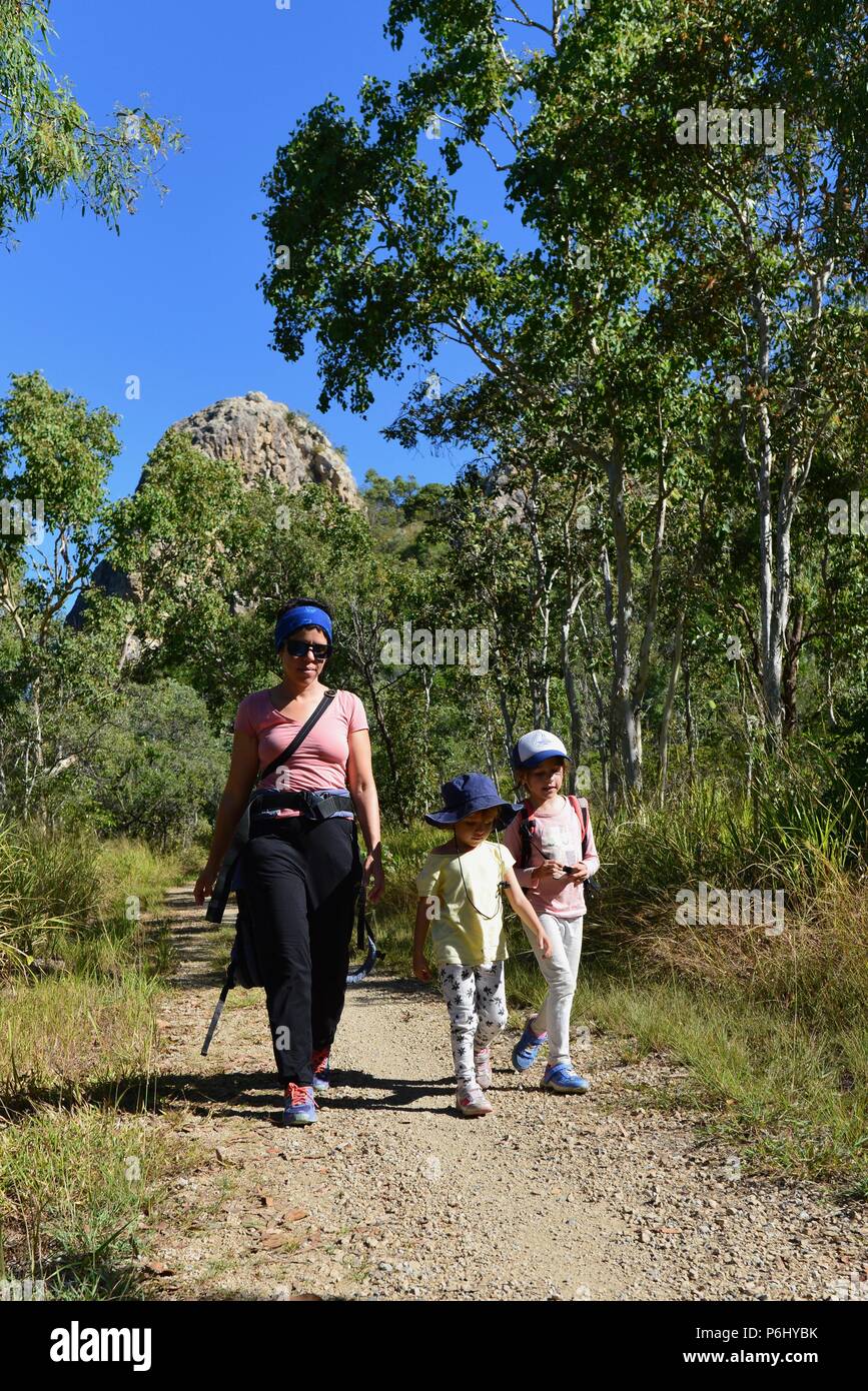 Mother walks with children through the Australian bush, Many peaks hike ...