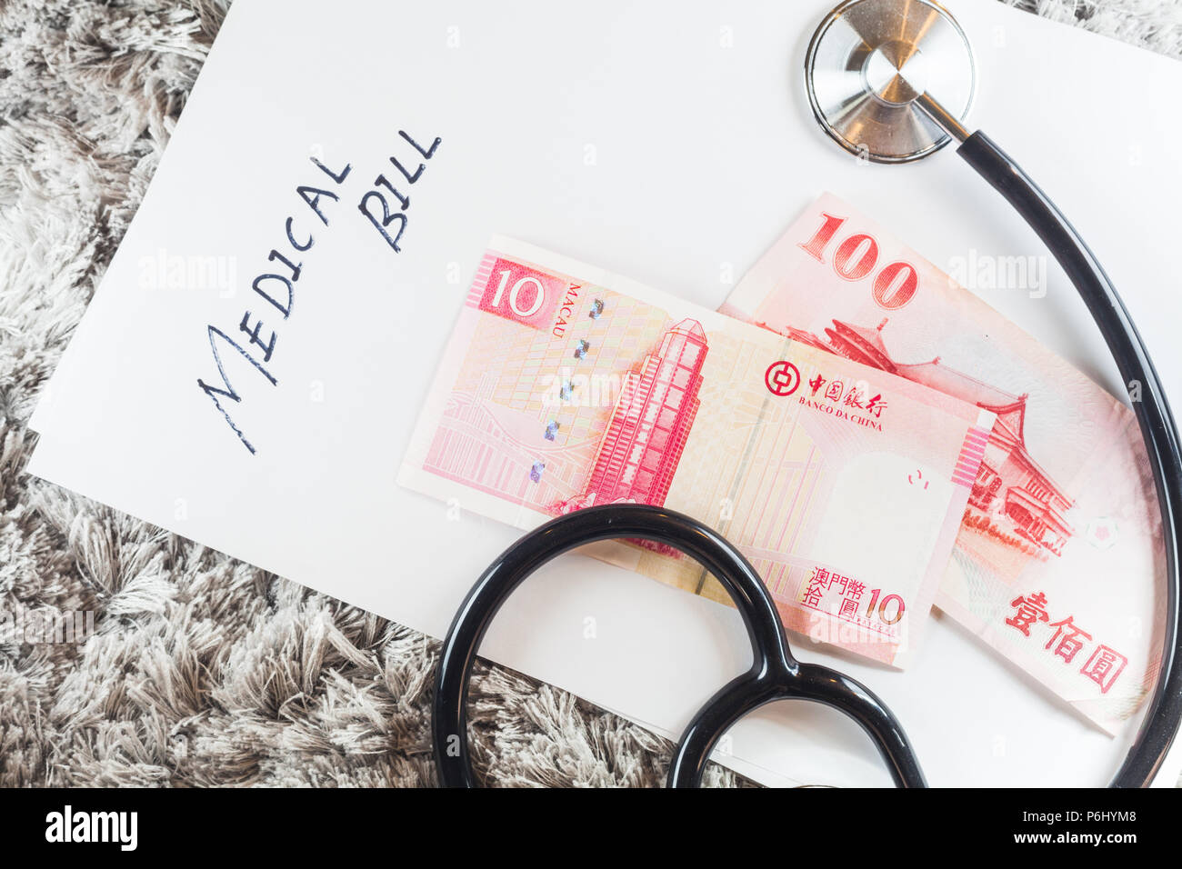 Stethoscope with wording of "Medical Bill" showing expensive healthcare ...